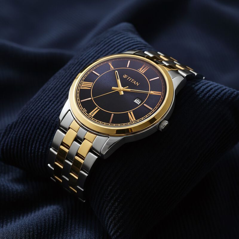 Buy Online Titan Karishma Festive Analog with Royal Blue Dial Dual Tone ...