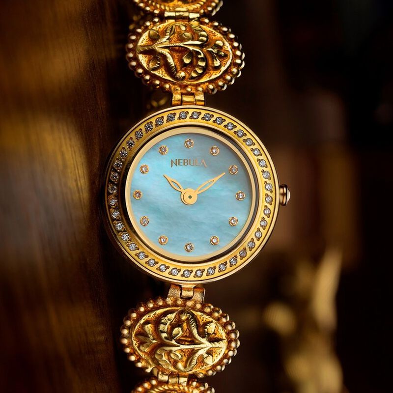 Buy Online Titan Nebula Nakashi Quartz Analog 18 Karat Solid Gold Watch ...