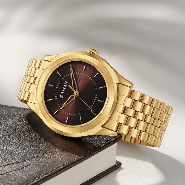 Buy Online Titan Karishma Zing Quartz Analog Brown Dial Stainless Steel ...