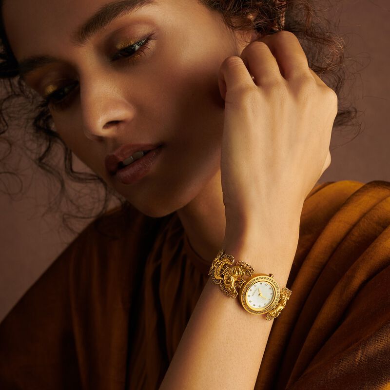Buy Online Titan Nebula Nakashi Quartz Analog 18 Karat Solid Gold Watch ...