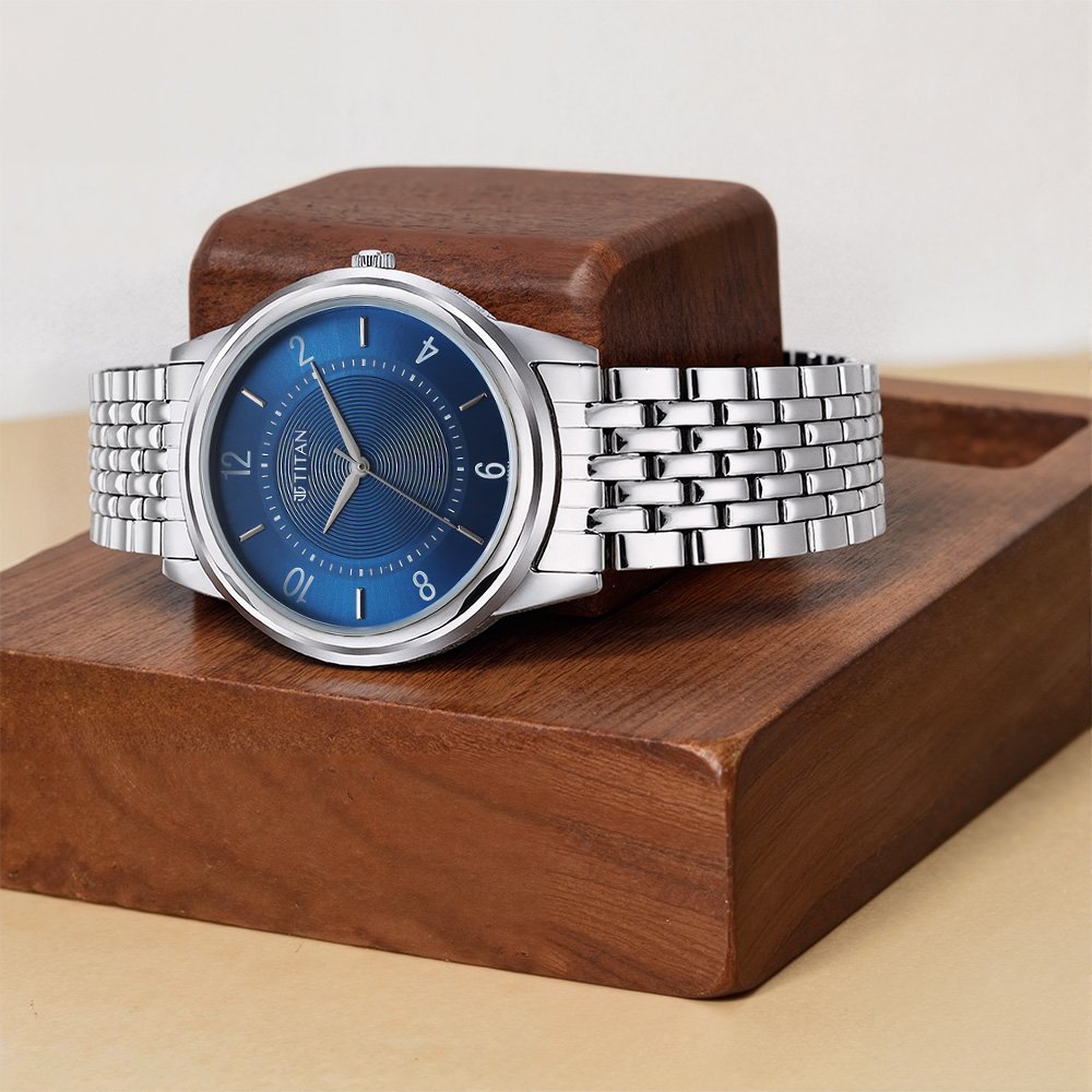 Buy Online Titan Karishma Zing Quartz Analog Blue Dial Stainless Steel ...