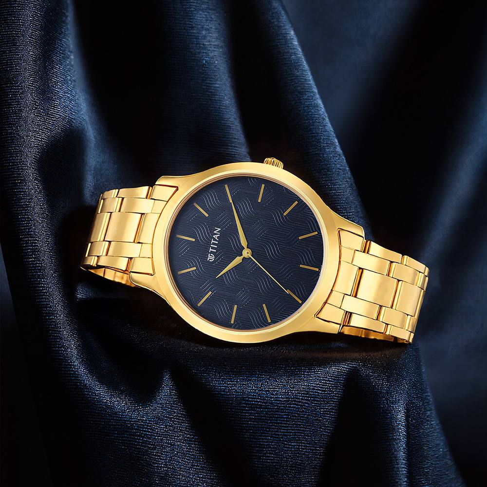 Buy Online Titan Karishma Radiance Blue Dial Analog Stainless Steel ...